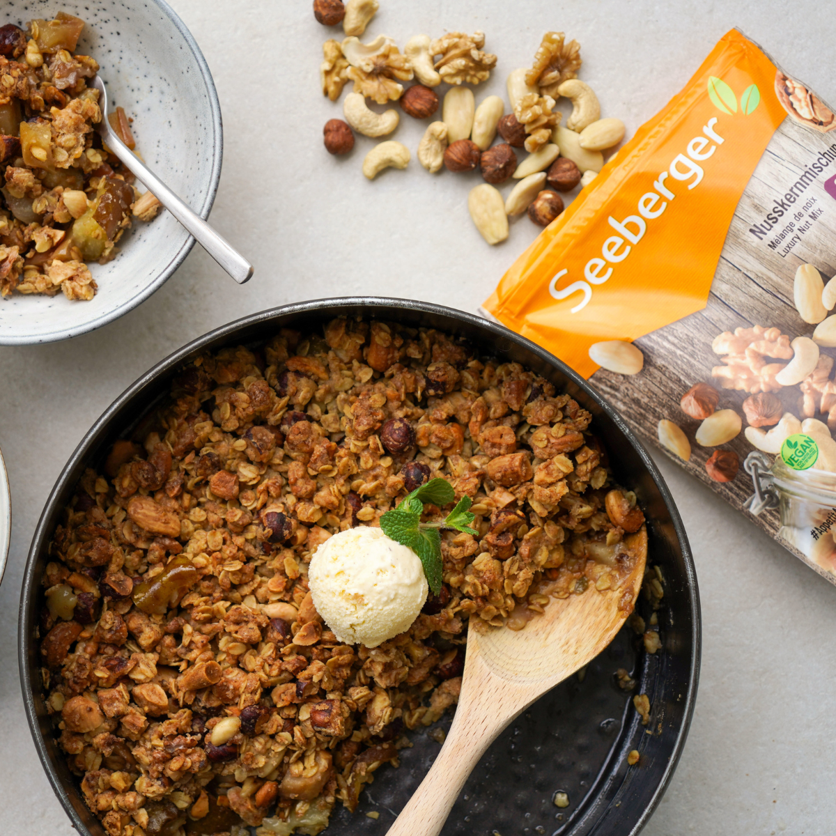 Vegan fruit crumble with vanilla ice cream